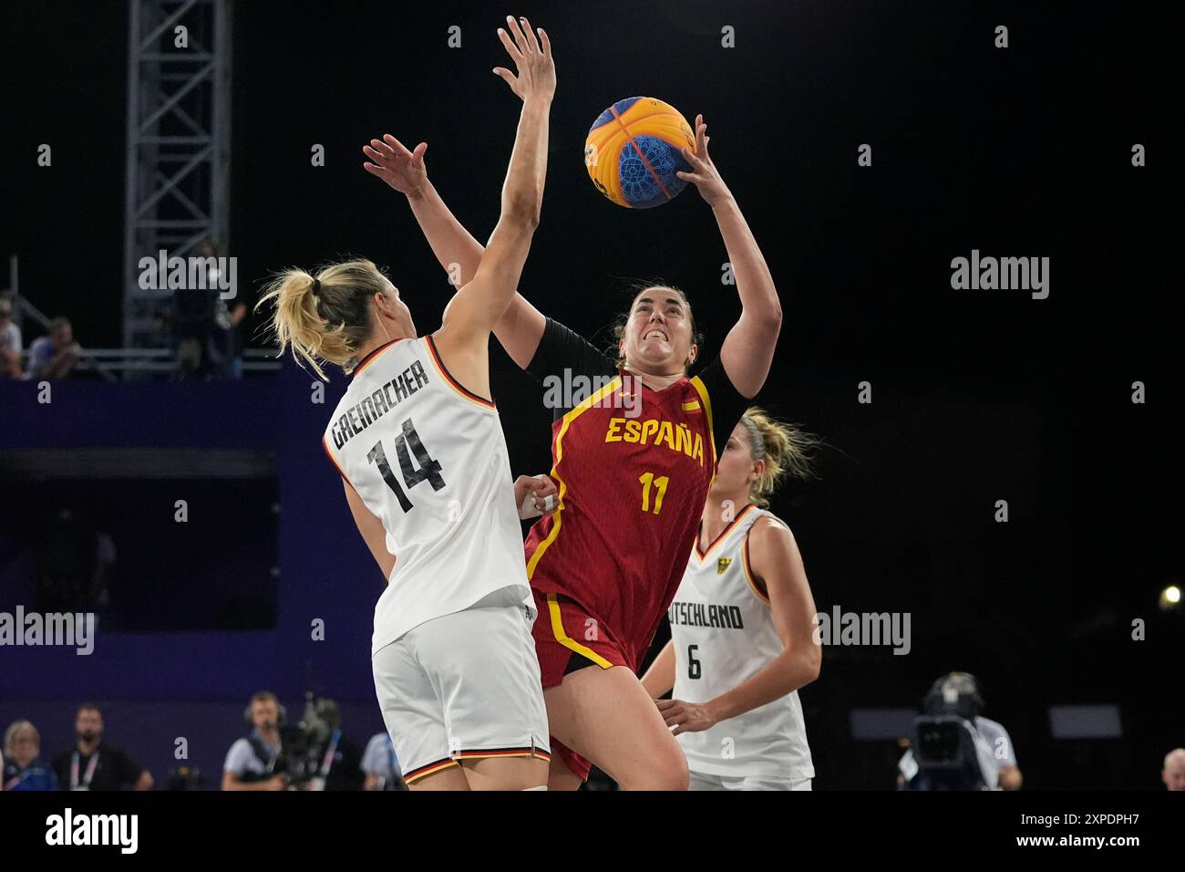 Spain's Vega Gimeno (11) shoots over Germany's Sonja Greinacher (14 ...