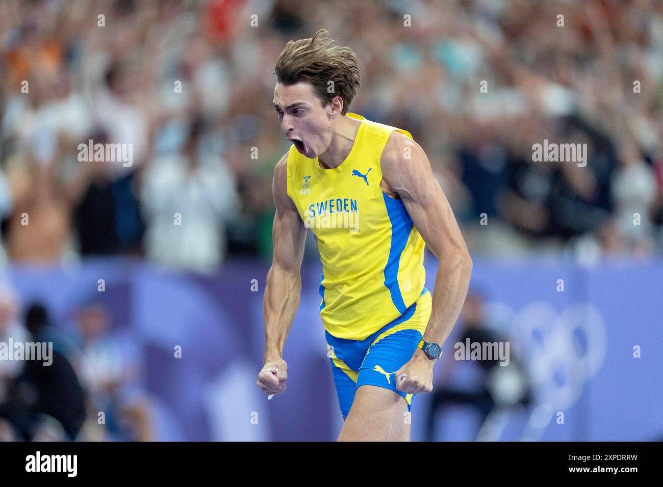 Armand Duplantis, of Sweden, reacts after setting a new world record in ...