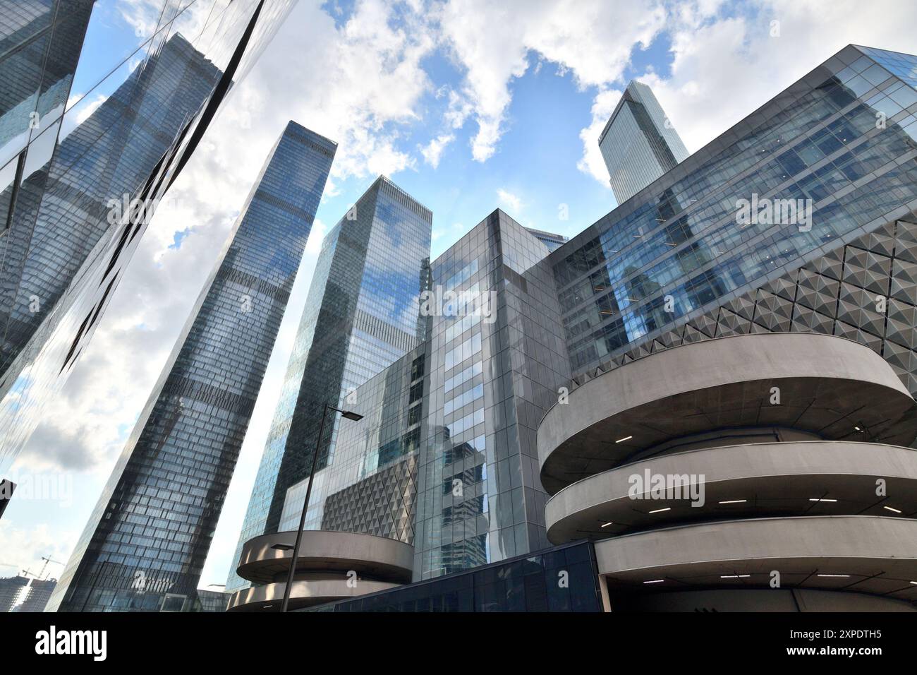 Glass skyscrapers filmed from below Stock Photo - Alamy