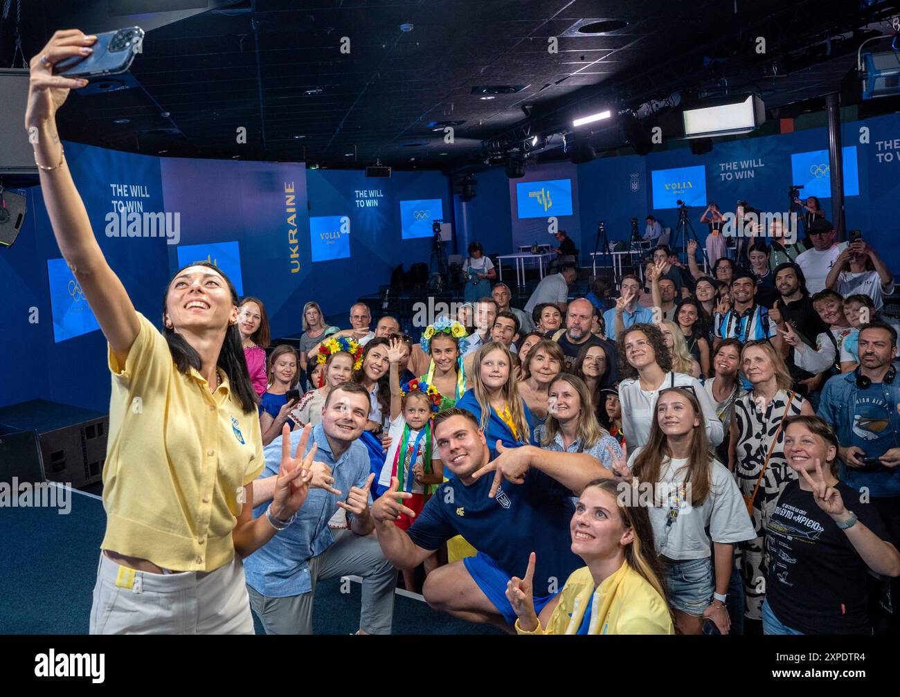 Ukrainian bronze medalist high jumper Iryna Gerashchenko takes a group ...