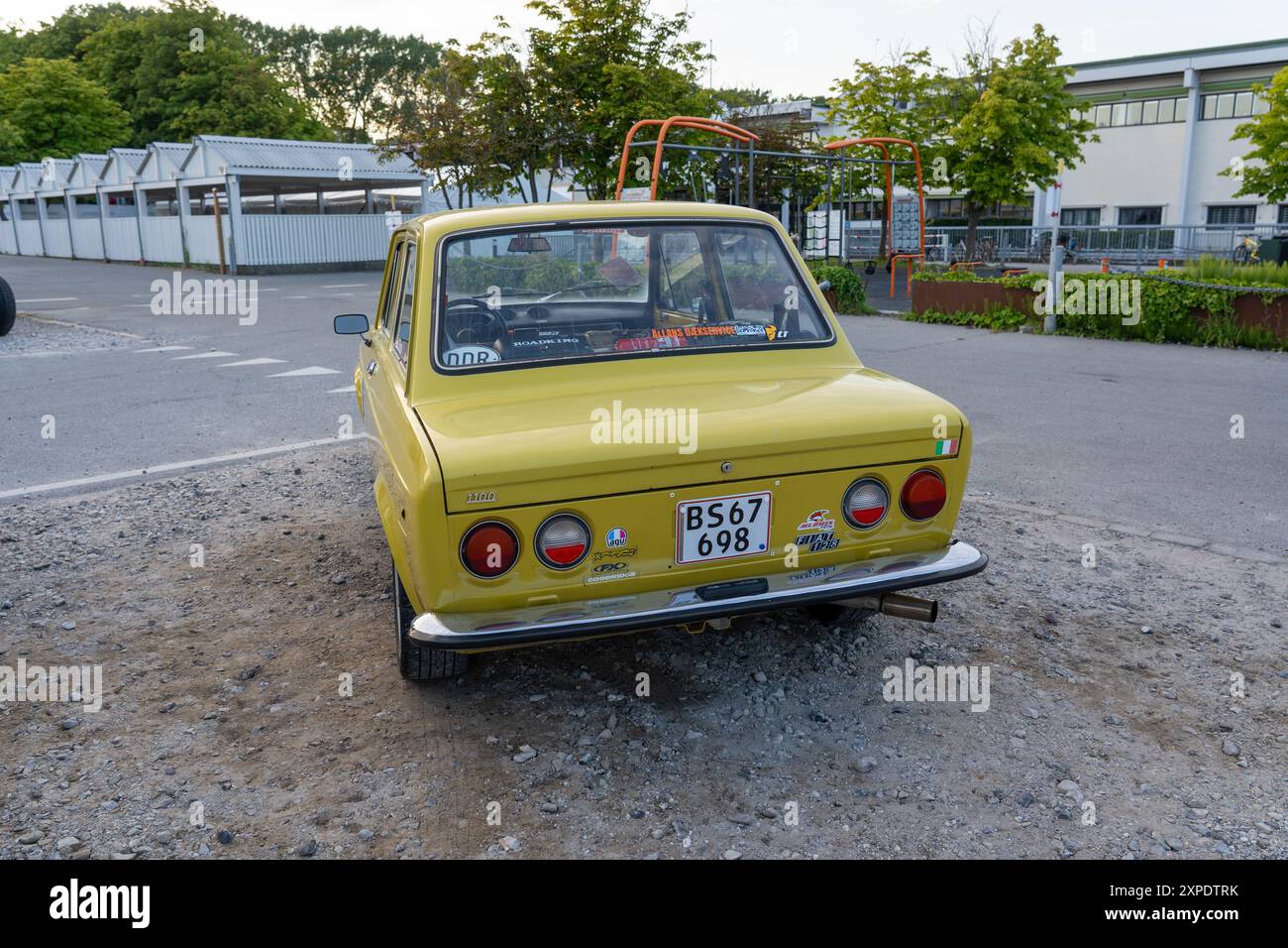 Mustard Colored Fiat 1100 Vintage Car Stock Photo - Alamy