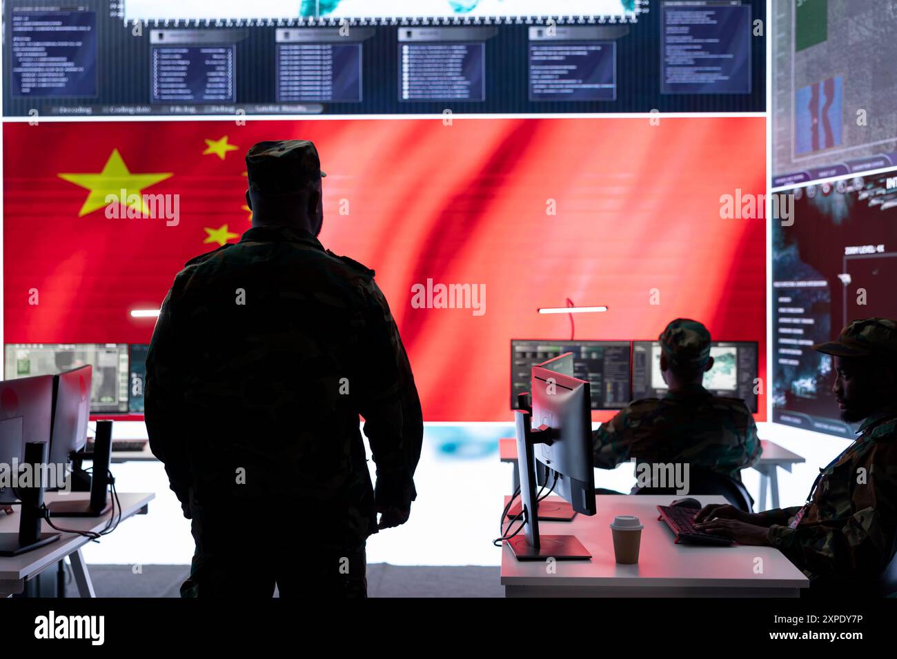 Chinese military officer analyzing information on big screen in a ...