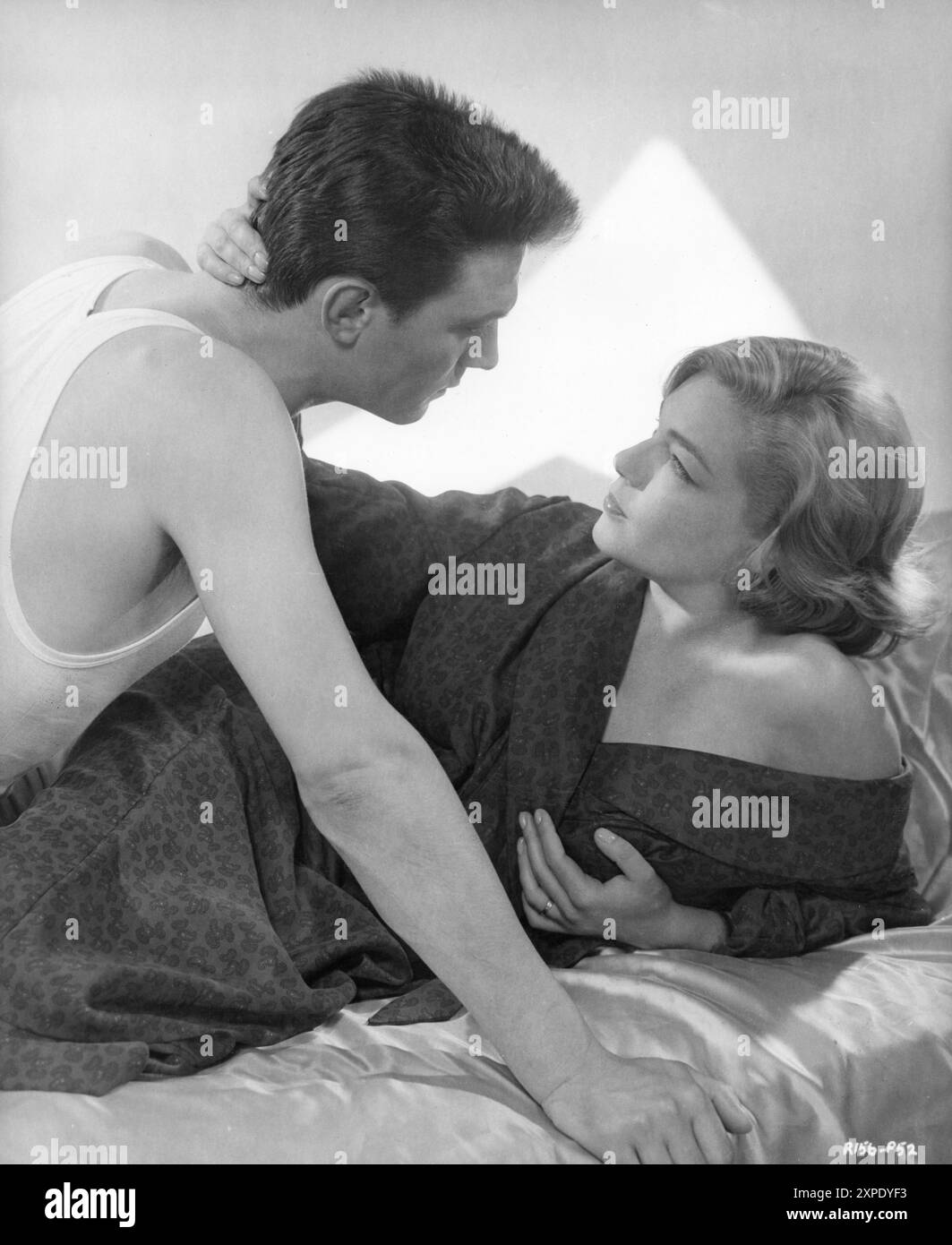 LAURENCE HARVEY as Joe Lampton and SIMONE SIGNORET as Alice Aisgill in ...
