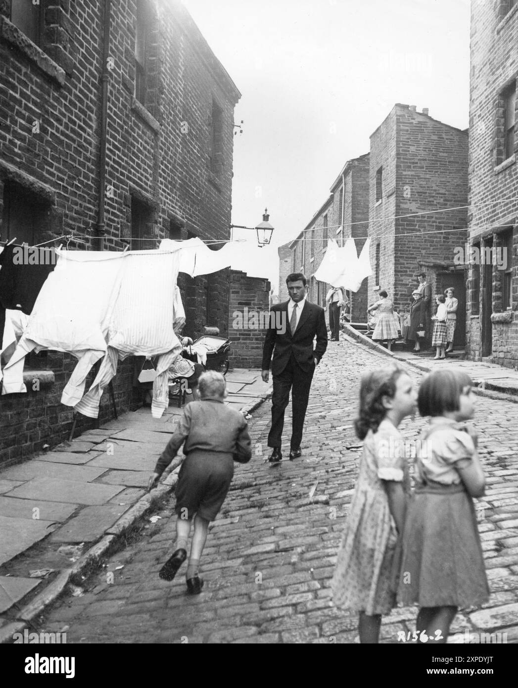 LAURENCE HARVEY in a scene from ROOM AT THE TOP (1959) Director JACK ...