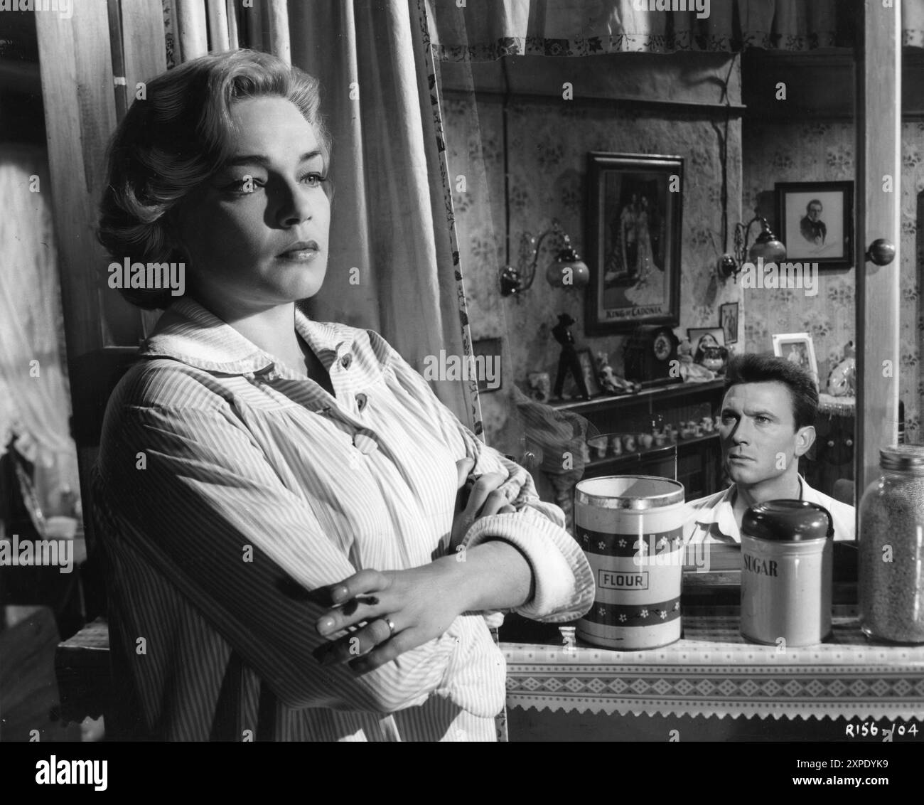 LAURENCE HARVEY and SIMONE SIGNORET in a scene from ROOM AT THE TOP ...