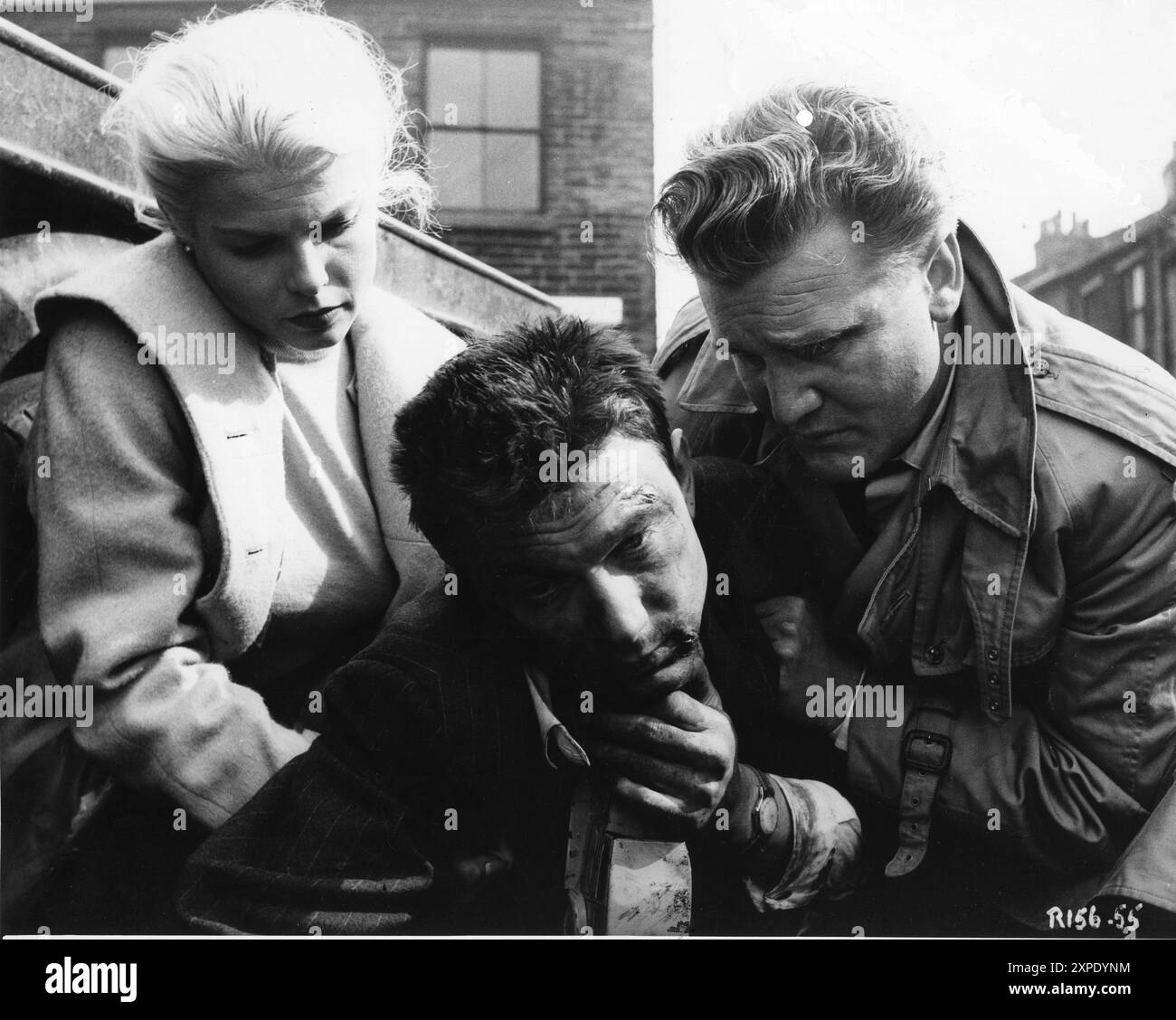 MARY PEACH, LAURENCE HARVEY and DONALD HOUSTON in a scene from ROOM AT ...