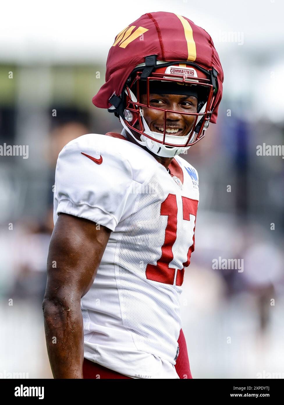 Washington Commanders wide receiver Terry McLaurin (17) smiles at fans ...