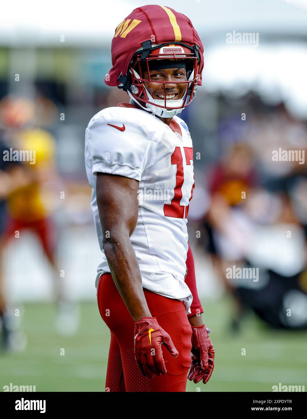 Washington Commanders wide receiver Terry McLaurin (17) smiles at fans ...