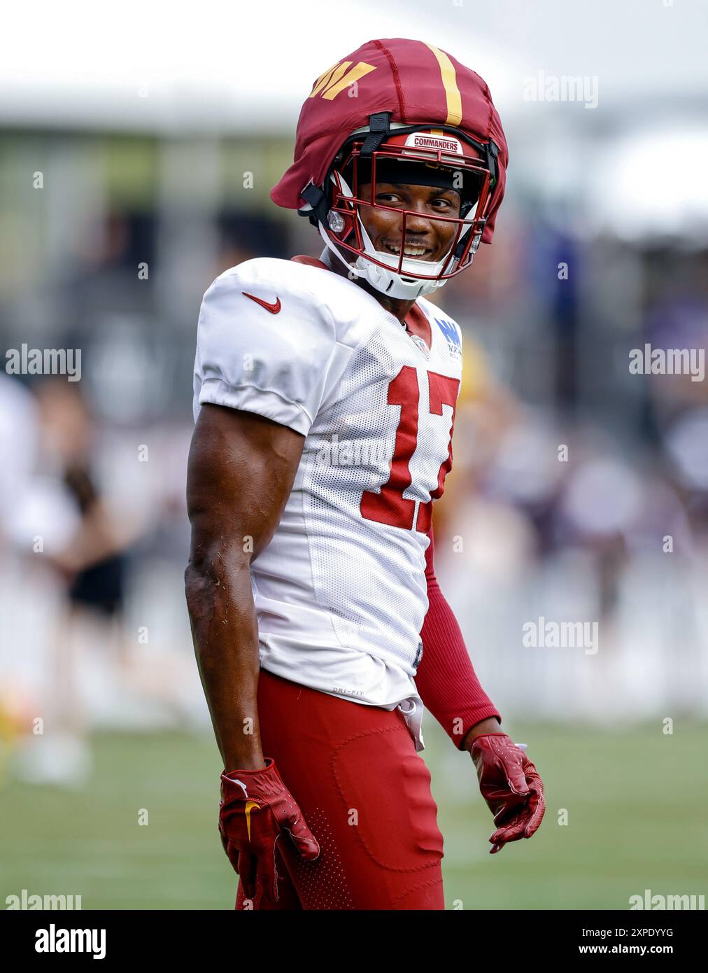 Washington Commanders wide receiver Terry McLaurin (17) smiles at fans ...