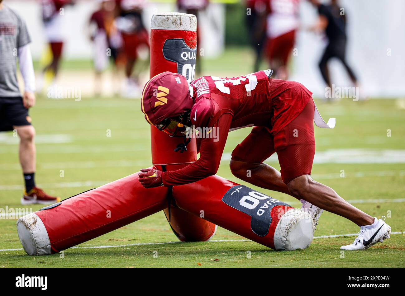 Washington Commanders corner back Nick Whiteside II (37) participating ...