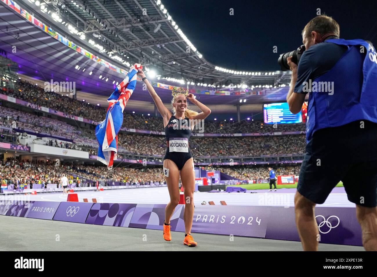 Keely Hodgkinson, of Britain, poses with a crown after winning the gold medal in the women's 800 ...