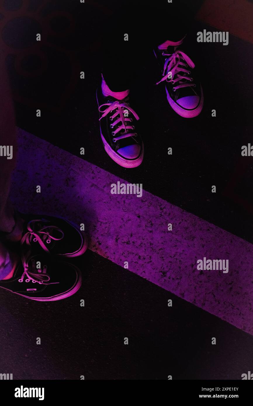 Vans Under Pink Purple Neon Sign Stock Photo - Alamy