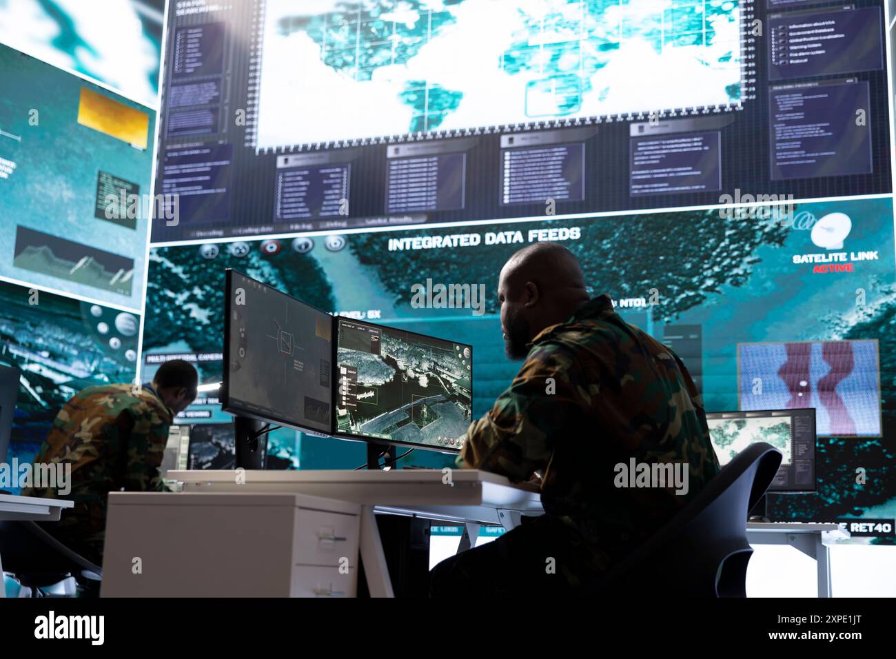 Army intelligence officers use modern computer systems and satellite ...