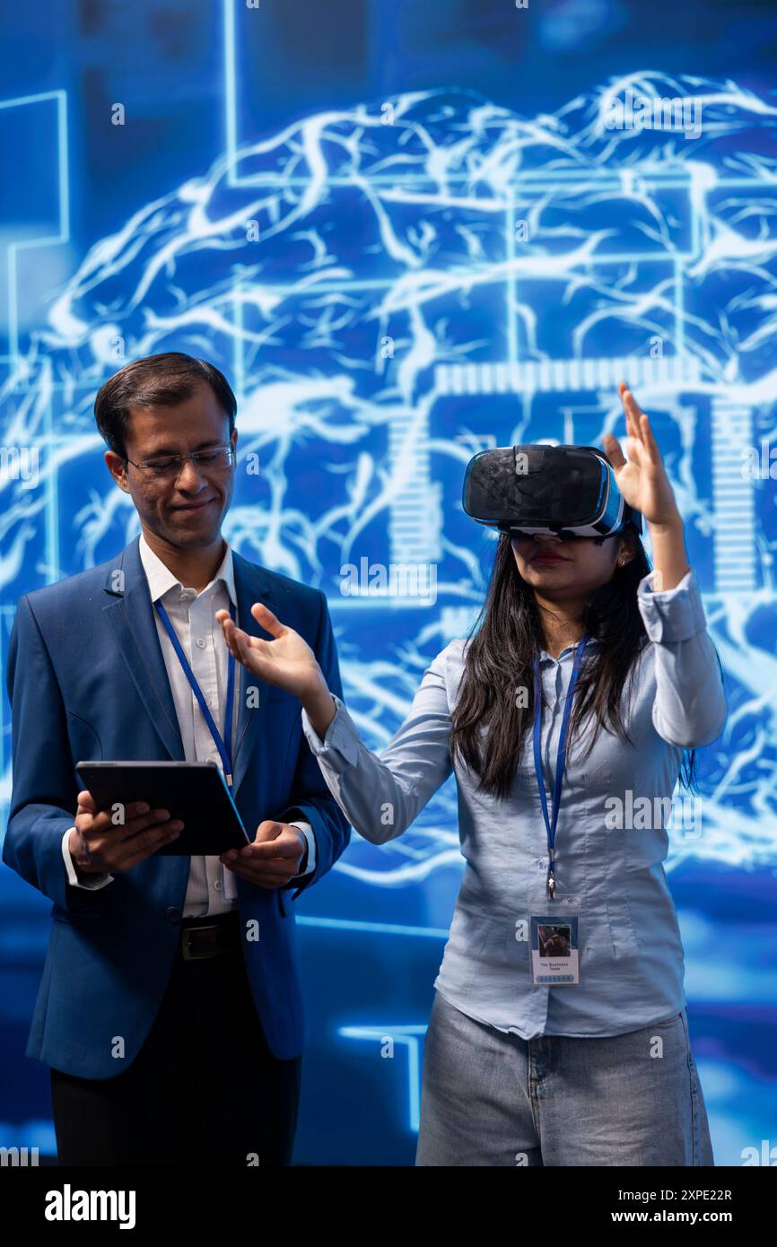 Expert doing VR demonstration at AI tech summit event gathering ...