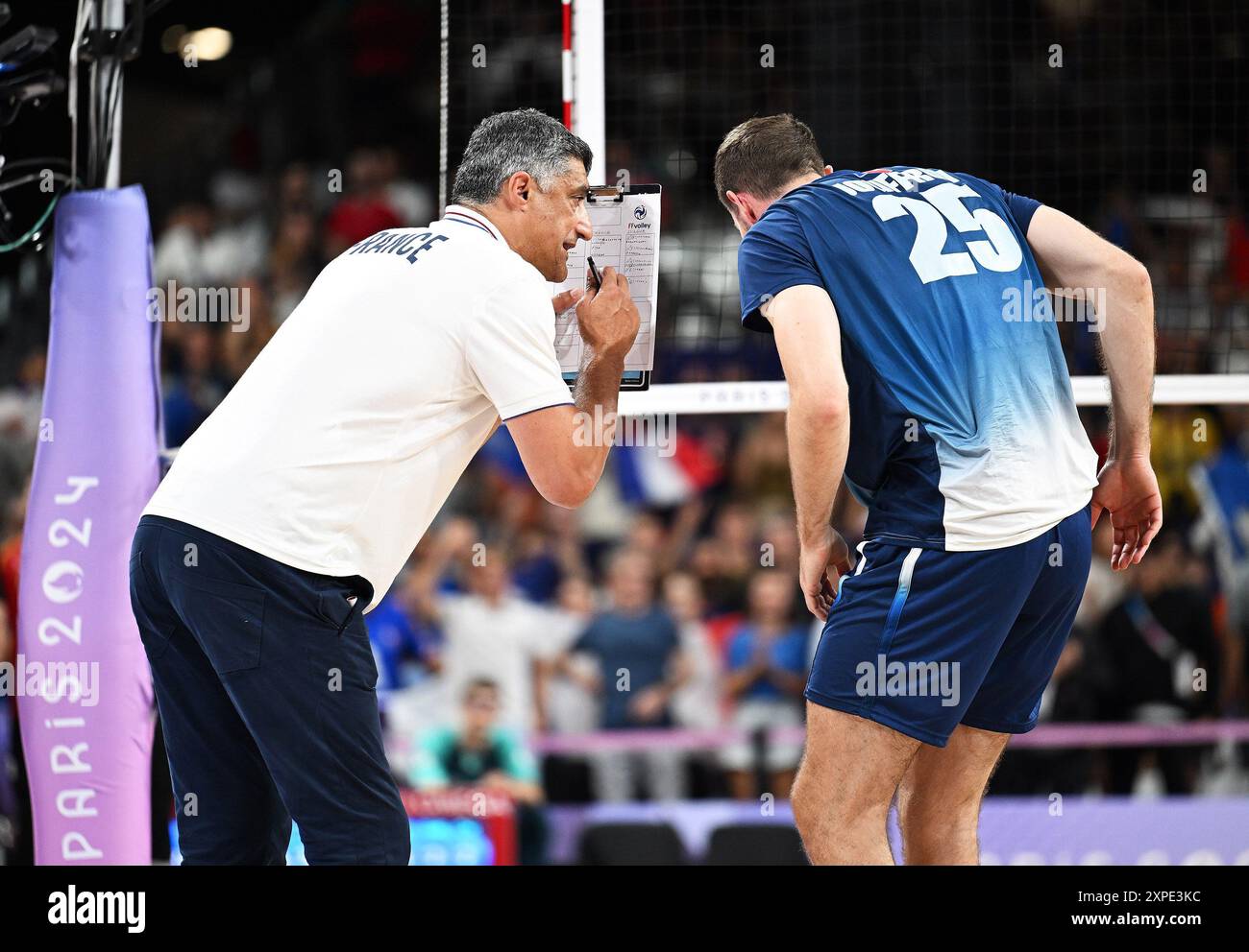 Paris, France. 5th Aug, 2024. Andrea Giani (L), head coach of team ...