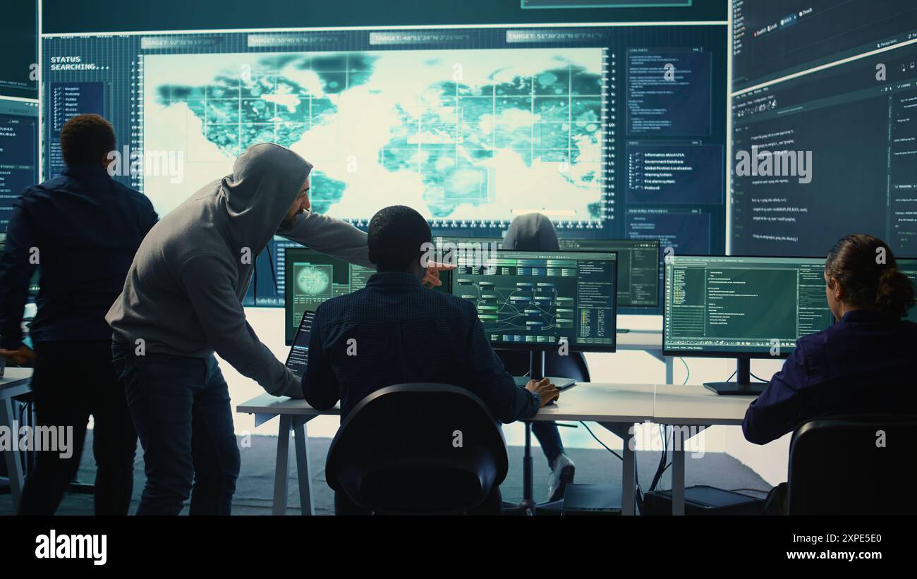Cyber security team conducting cyber surveillance and threat detection in a governmental agency ...