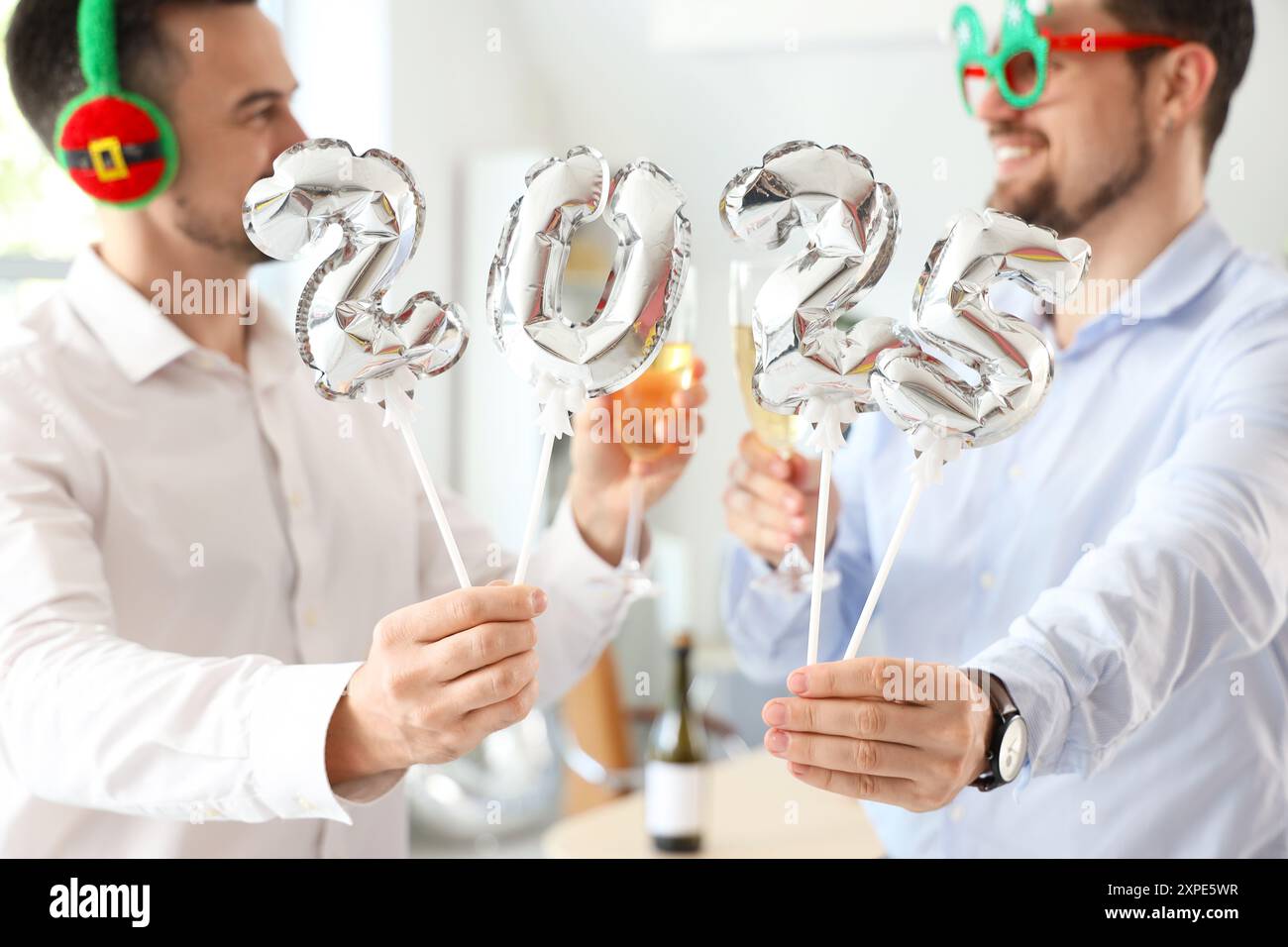 Champagne glasses celebrating 2025 new hi-res stock photography and ...
