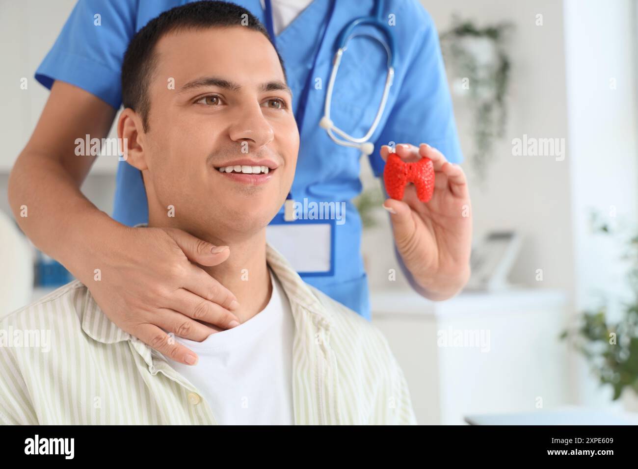 Doctor checking patient endocrine hi-res stock photography and images ...