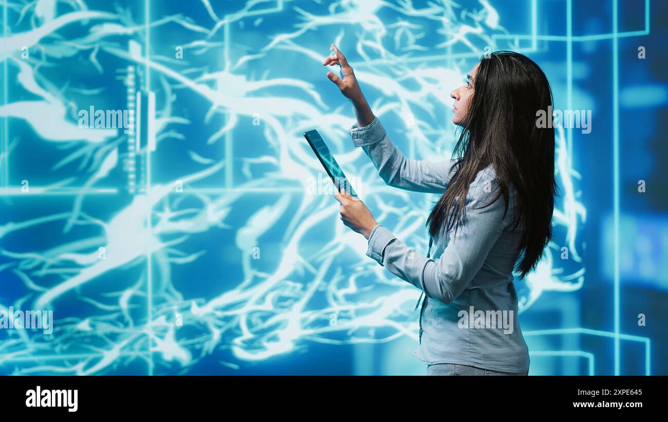 Computer scientist using artificial intelligence computing simulating human brain thought ...