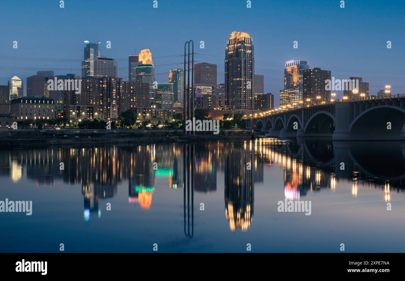 Downtown Minneapolis and the 3rd Avenue bridge at night from across the ...