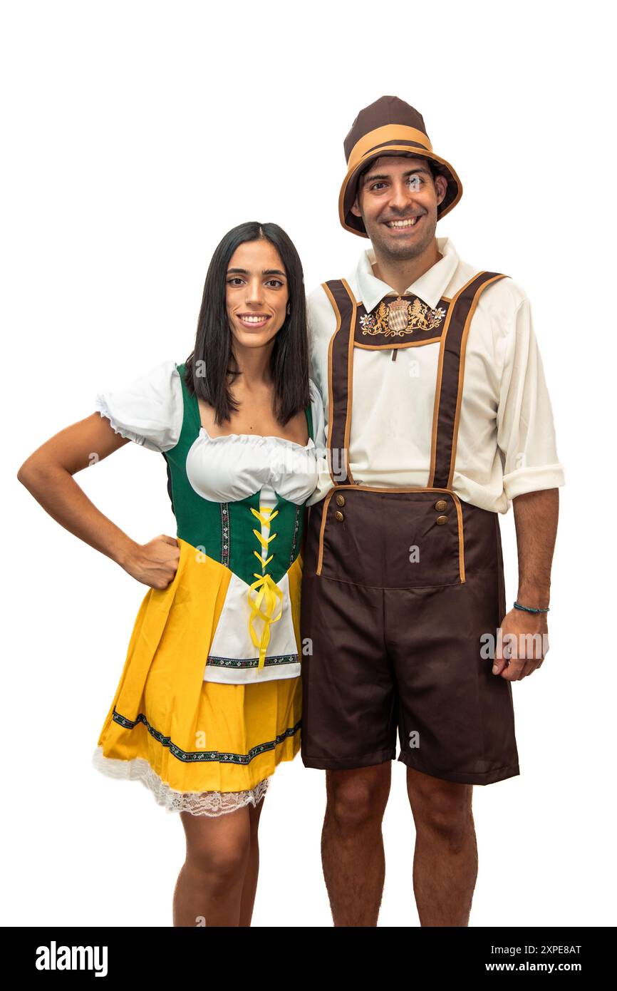 vertical young Bavarian couple dressed in traditional Oktoberfest ...