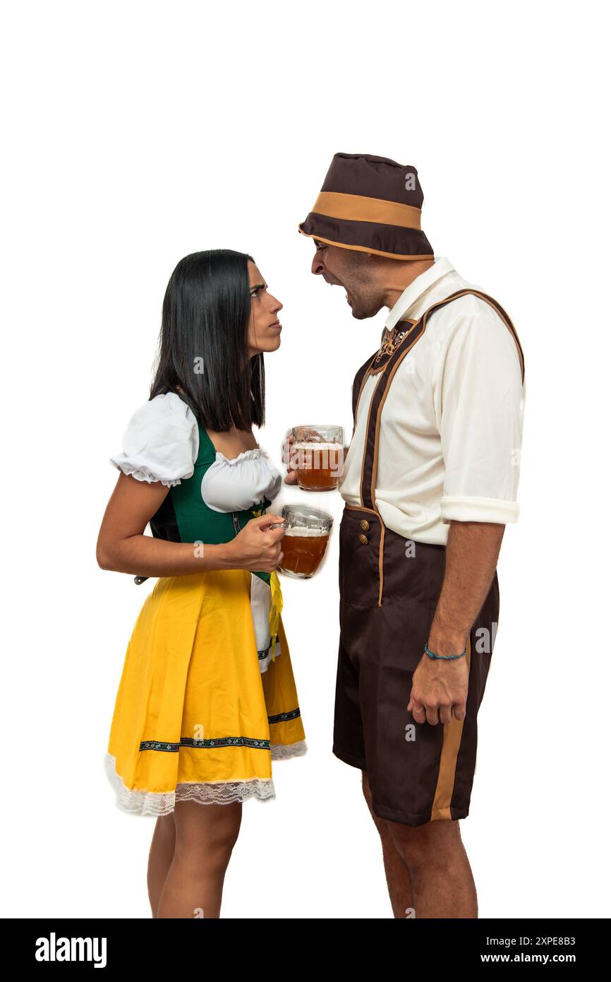 vertical young bavarian couple, dressed in traditional Oktoberfest ...