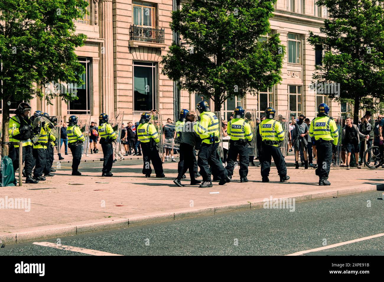 Riot Police in Liverpool during the 'save the children' fascist march ...