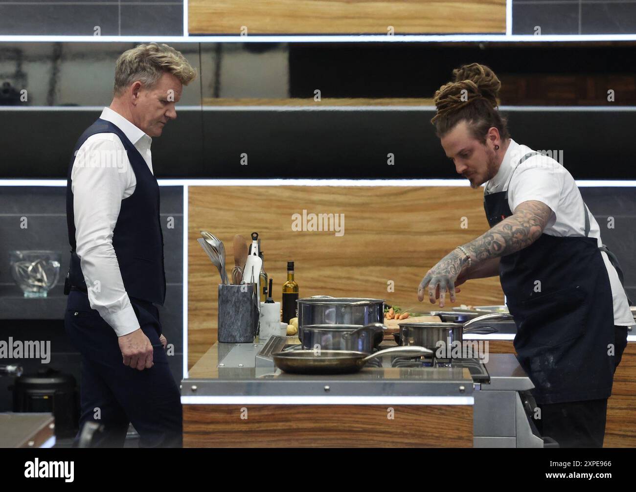 NEXT LEVEL CHEF, from left: host Gordon Ramsay, contestant Zach Laidlaw ...