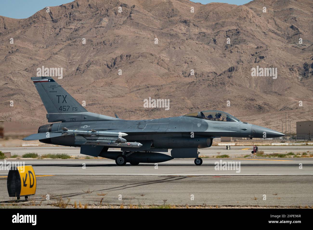 An F-16 Fighting Falcon assigned to the 706th Aggressor Squadron ...