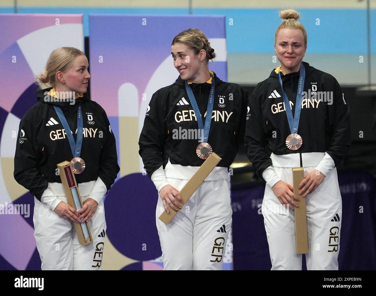 Paris, France. 5th Aug, 2024. Bronze medalists team Germany react ...