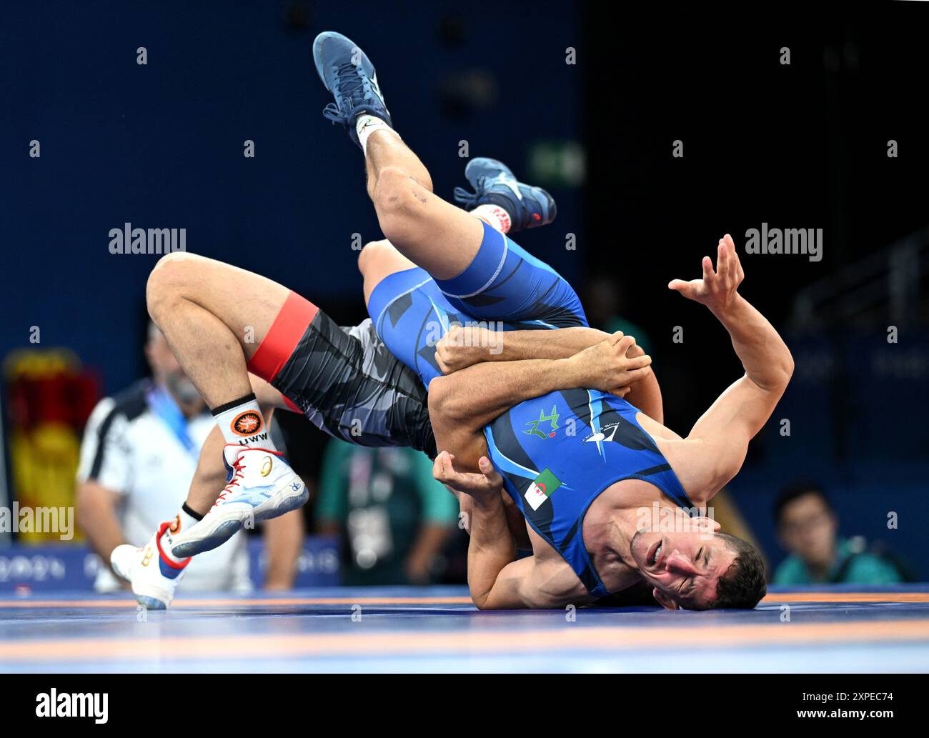 Paris, France. 5th Aug, 2024. Abdelkarim Fergat (blue) of Algeria ...