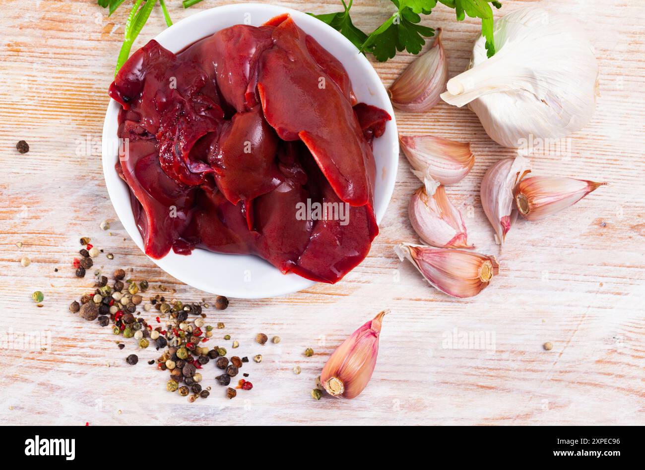 Raw rabbit liver with seasonings Stock Photo - Alamy