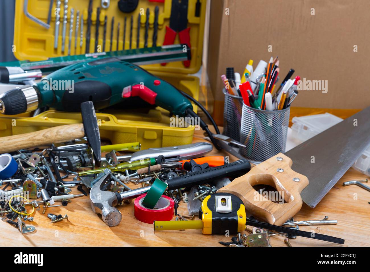 Different screws and tools on the table in the workshop Stock Photo - Alamy