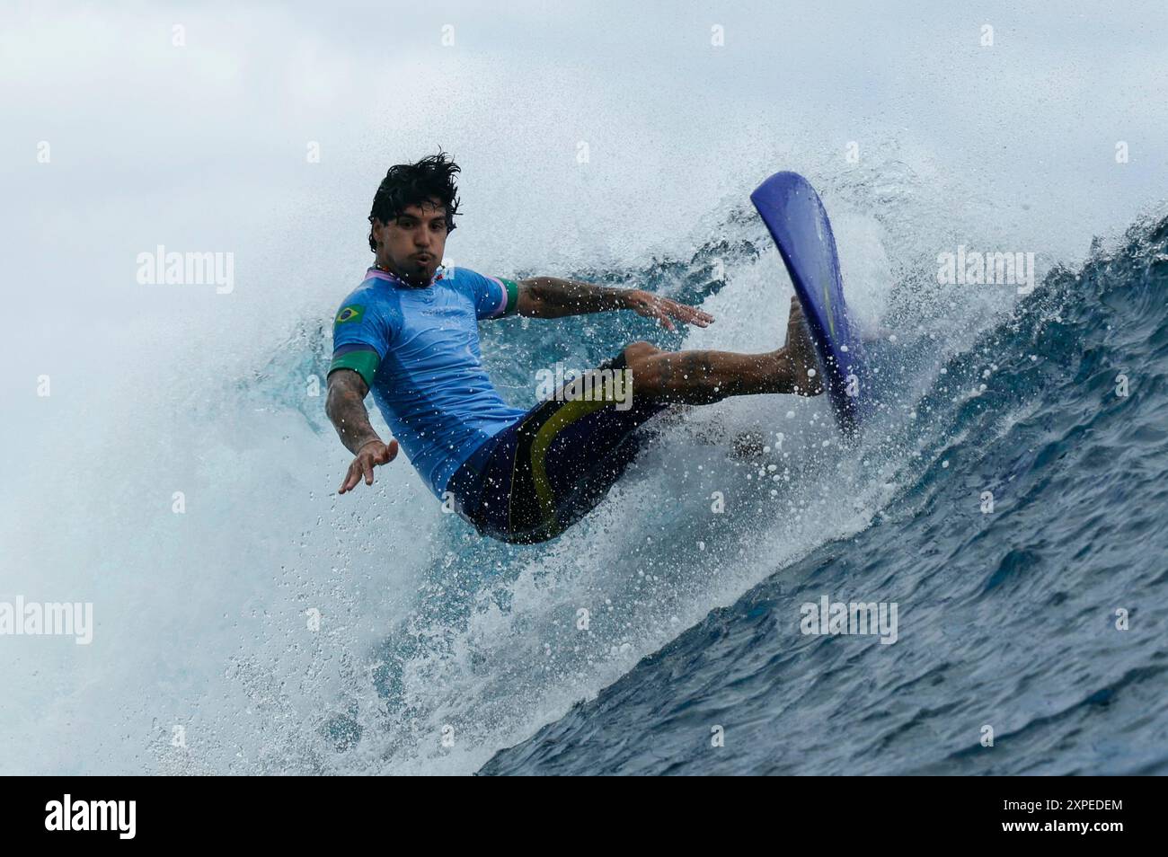 Gabriel Medina, of Brazil, does a snap in the bronze medal final of the ...
