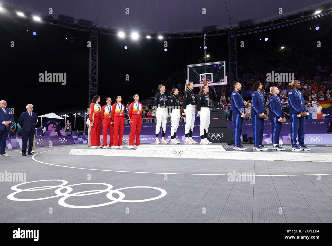 Paris, France. 5th Aug, 2024. Gold medalists team Germany (C), silver medalists team Spain (L ...