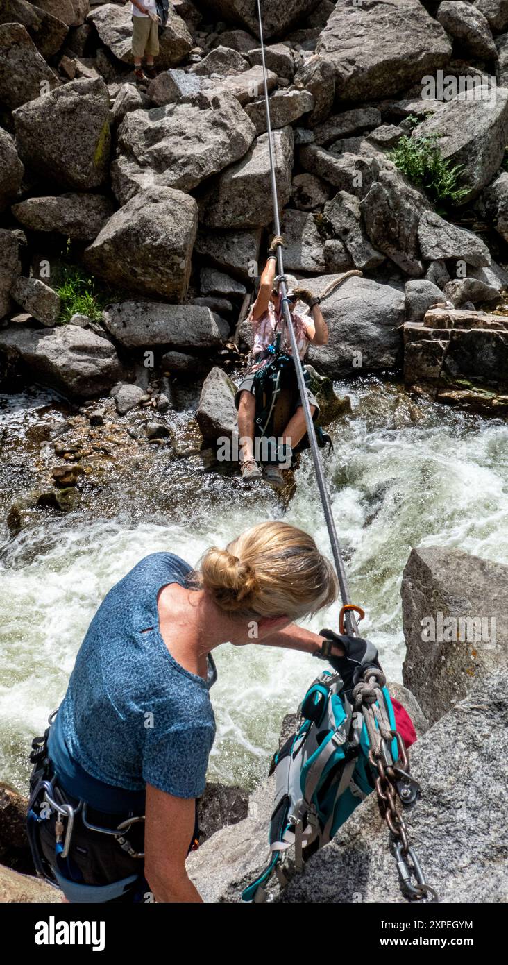 Women traverse rope hi-res stock photography and images - Alamy