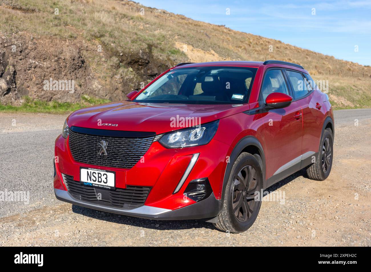 Peugeot 2023 subcompact crossover SUV car parked on Summit Road, Banks ...