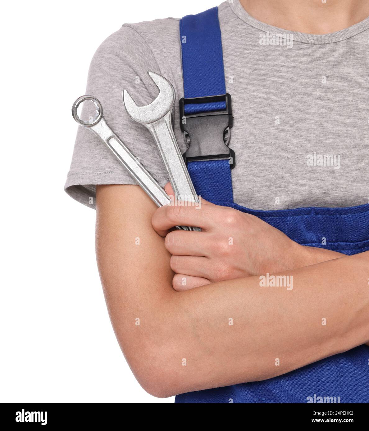 Auto mechanic with wrenches on white background, closeup Stock Photo ...