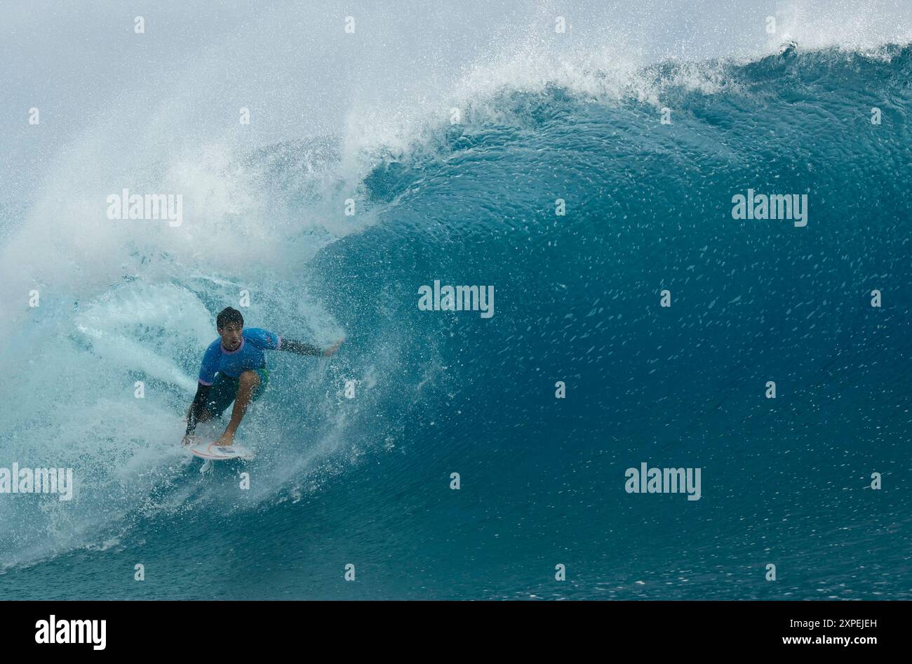 Jack Robinson, of Australia, gets a barrel in the gold medal final in ...