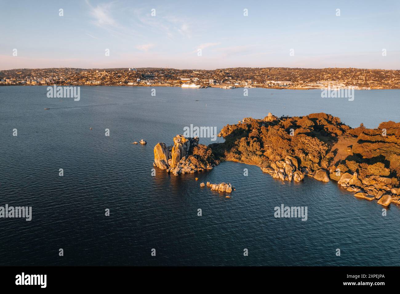Aerial drone photo during sunset Lake Victoria, Mwanza, City of Rocks ...