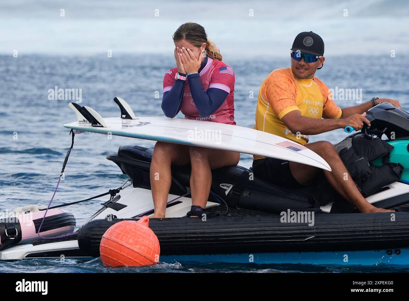 Caroline Marks, of the United States, left, reacts after winning the ...