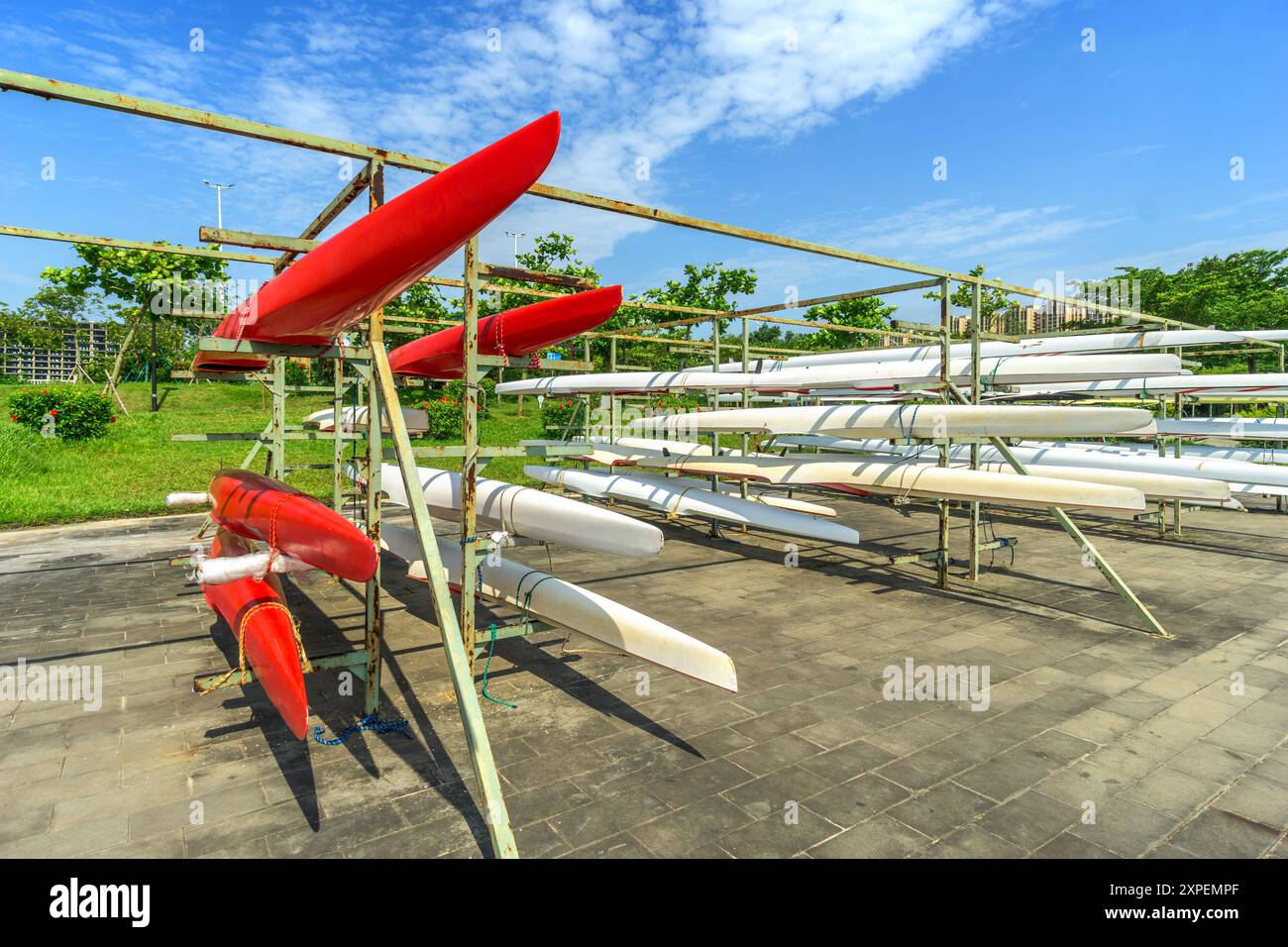 Kayaks stored on a rack on the beach Stock Photo - Alamy