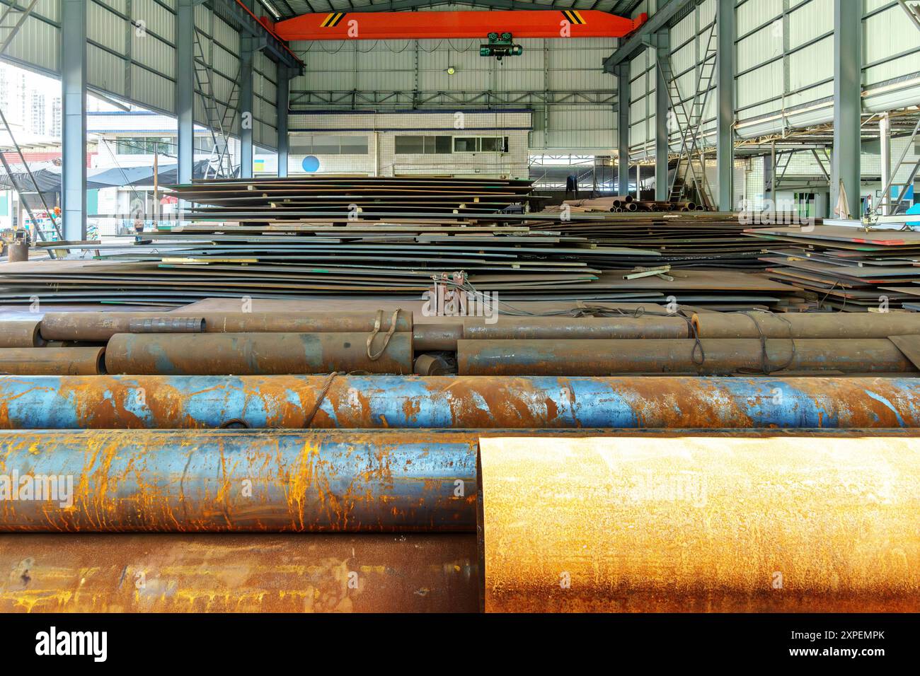 Steel factory floor, stacked with a lot of steel Stock Photo - Alamy