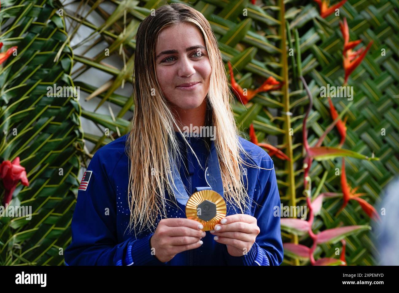 Caroline Marks, of the United States, holds her gold medal after ...