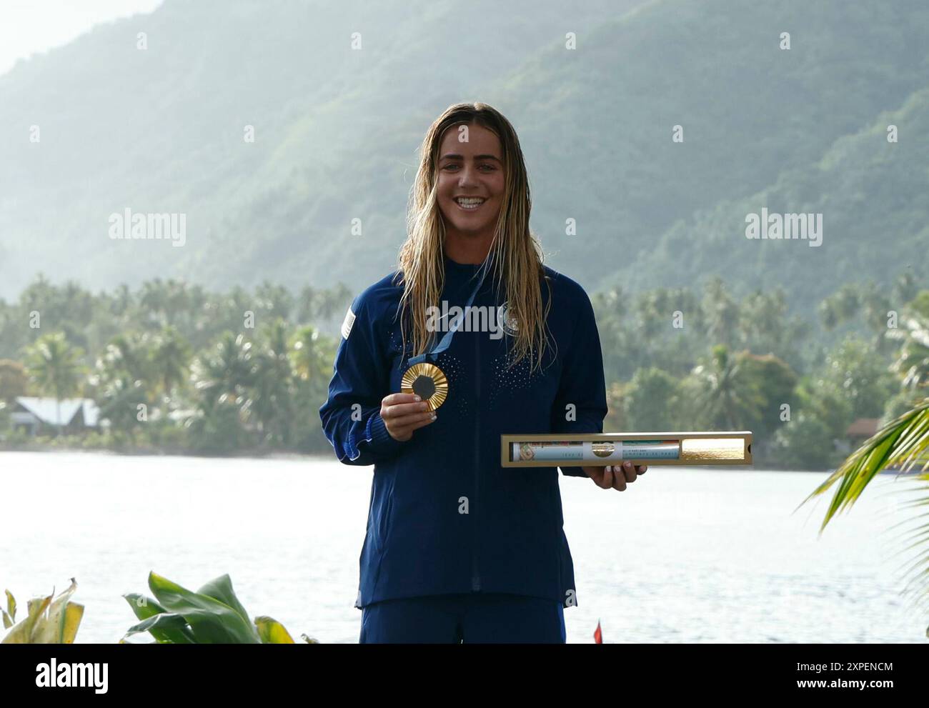 Gold medalist Caroline Marks, center, of the United States, poses at ...