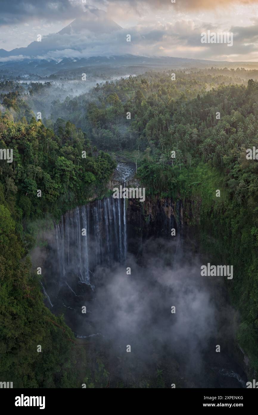 Aerial view of Tumpak Sewu waterfall and Semeru mountain, East java ...