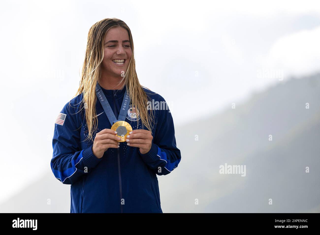 Caroline Marks, of the United States, poses on the podium after winning ...