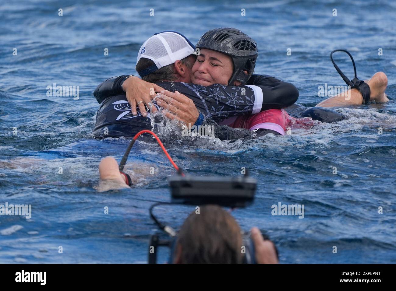 Johanne Defay, of France, right, celebrates with her coach and husband ...