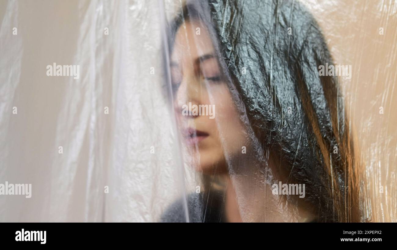 Introspective moment captured in an artistic individuality of a woman ...