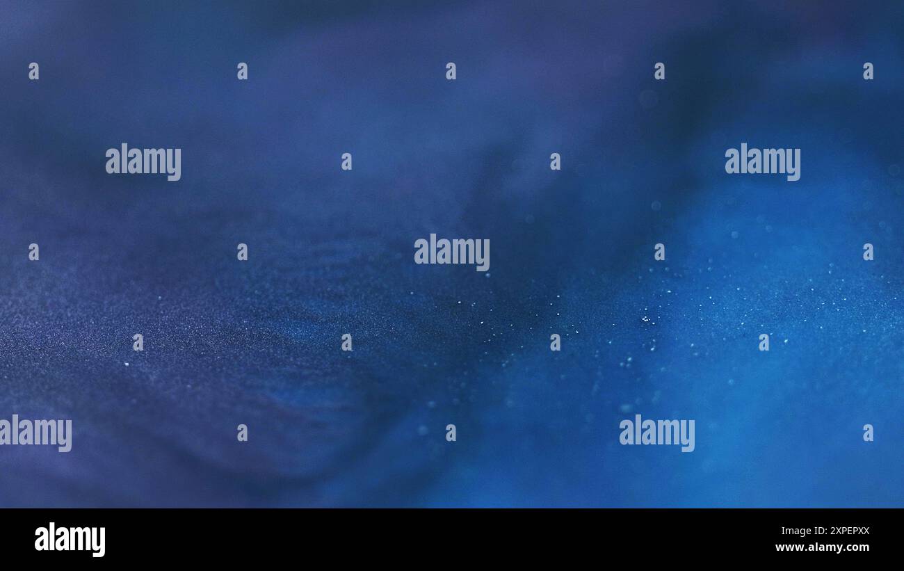 Shimmering flow. Glitter wave. Blur blue color paint shiny glowing twinkle particles texture ...